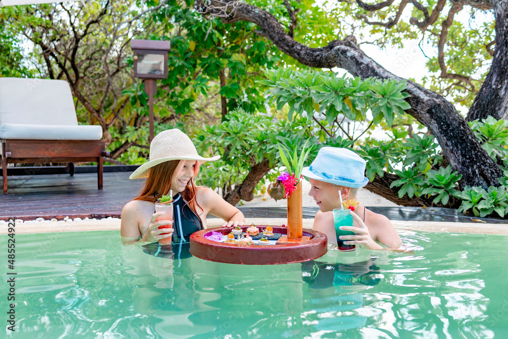 cute siblings school boy and teenage girl with served floating tray in ...