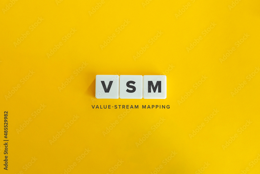 Value-stream mapping (VSM) Banner. Letter tiles on bright orange ...