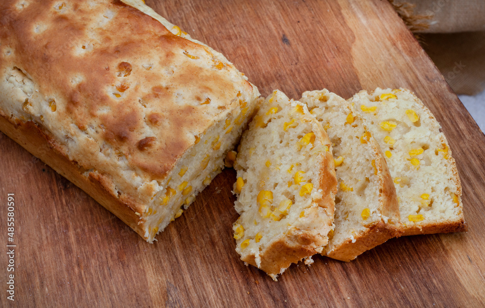 Mielie bread, a South African bread with whole sweetcorn on rustic ...