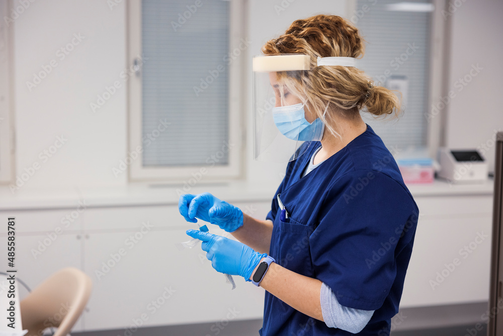 Female doctor preparing covid-19 swab test Stock Photo | Adobe Stock