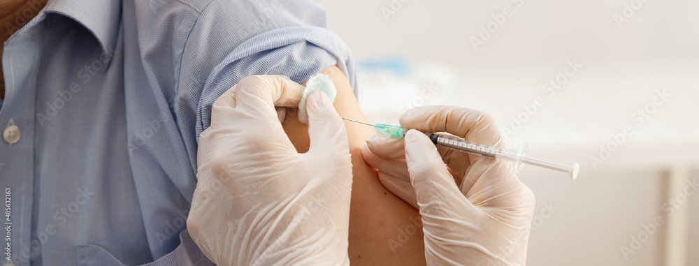 People getting a vaccination to prevent pandemic concept. Mature Woman ...
