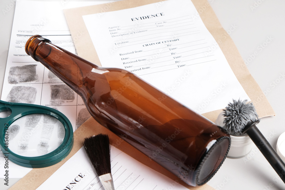 Forensic fingerprint analysis, evidence - glass bottle and fingerprint ...