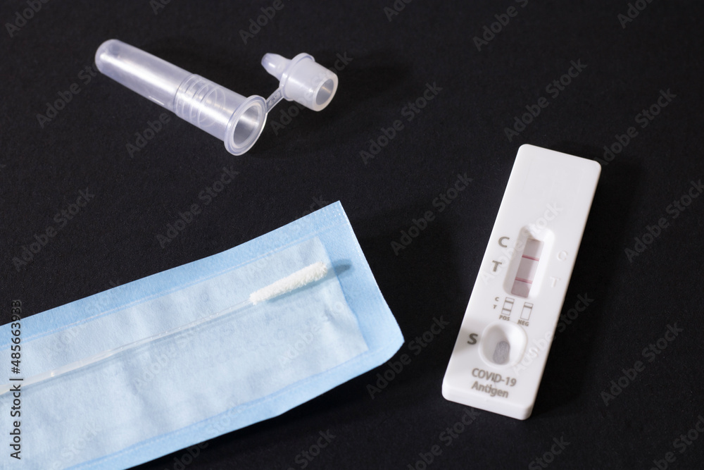 Positive rapid RST test for streptococcus on a dark background. RADT ...