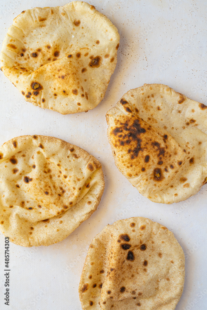 Egyptian Arab flatbreads - Aish Baladi top view on beige background ...