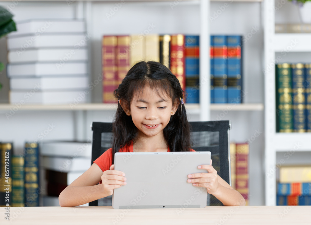 Asian clever smart diligent young primary school girl daughter in ...