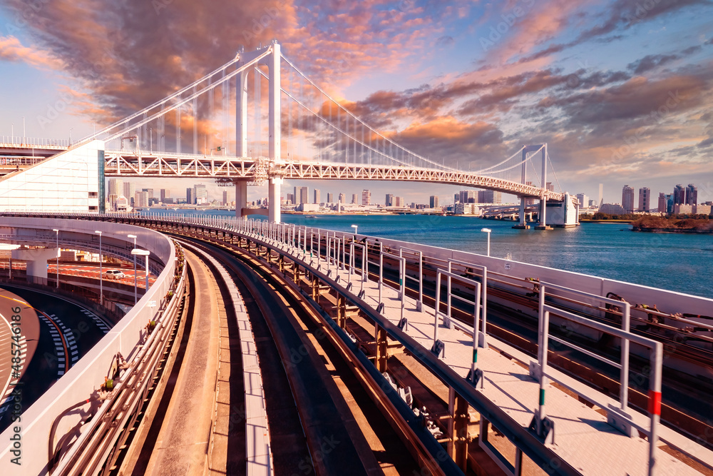 Rainbow Bridge Tokyo. Japan railroad. Arrival at Rainbow Bridge. Road ...
