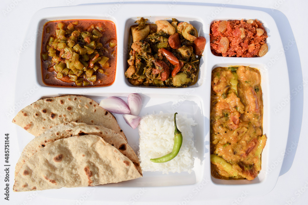 Indian Simple homemade lunch of Roti, sabji with mix veg brinjal potato ...