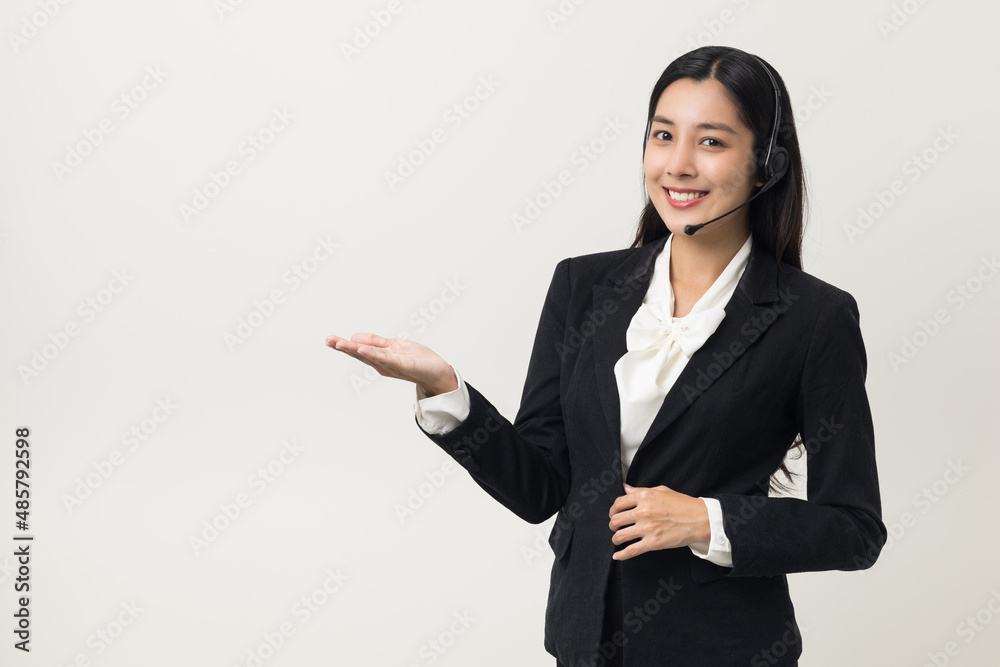 Happy young asian business woman call centre palm up hand to blank ...