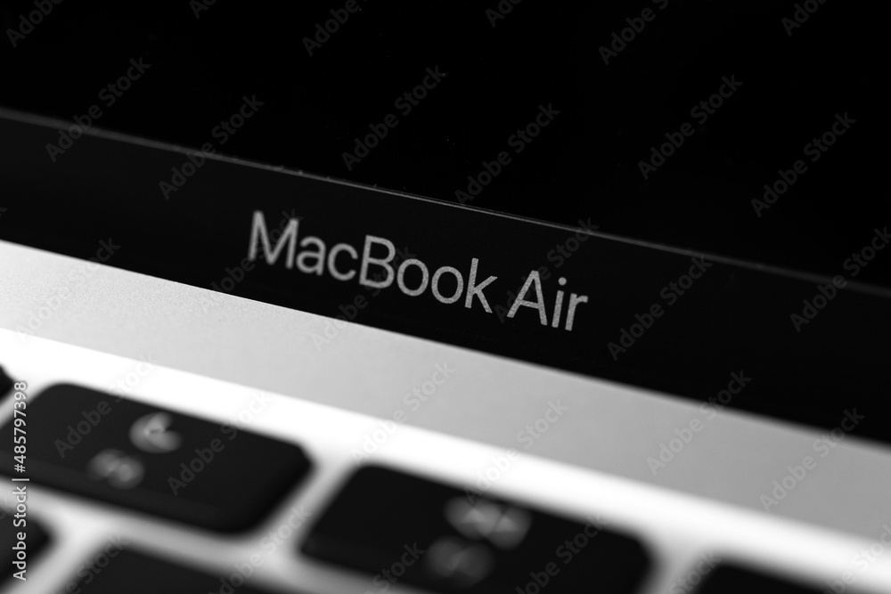 Apple Macbook Air logo close-up. Modern laptop on Apple M1 and MacOS ...