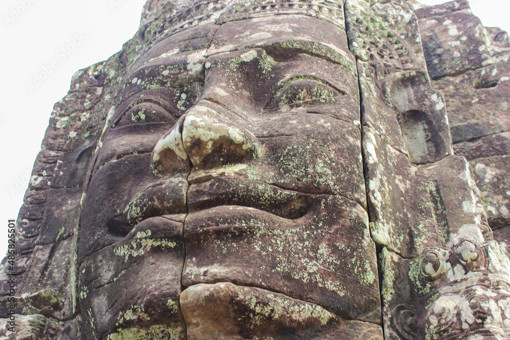 Ancient Stone Temple with Smiling Faces in Angkor Wat Stock Photo ...