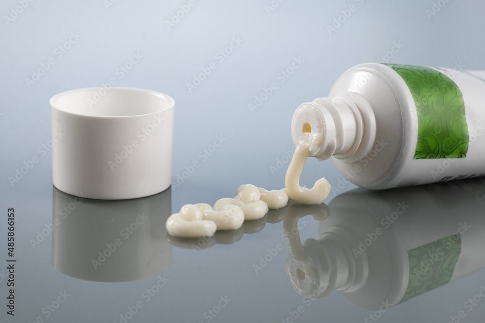 ointment for external use is slightly squeezed out of the tube next to ...