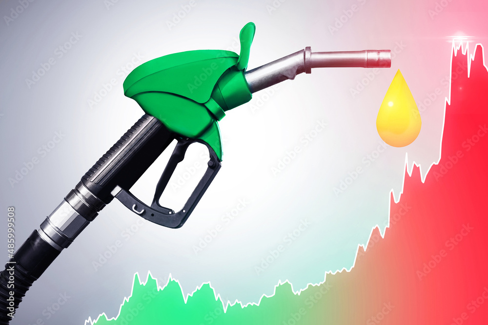 Fuel nozzle and rising chart showing gasoline price increase Stock ...