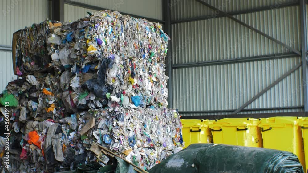 Stack of different types of large garbage dump, plastic bags, and ...
