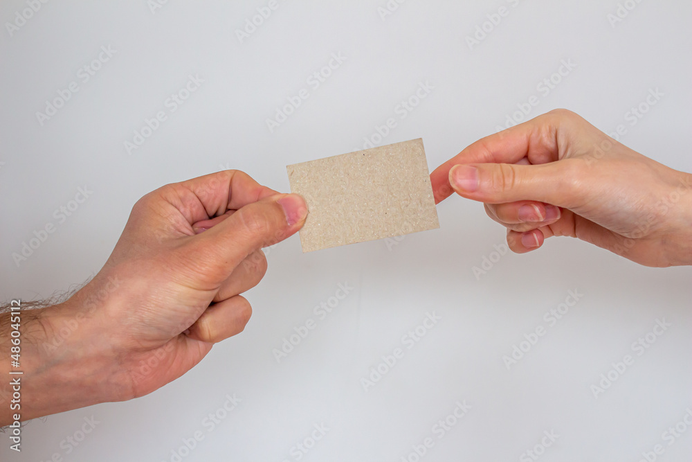 Two hands exchanging blank business card. Mockup business card template ...