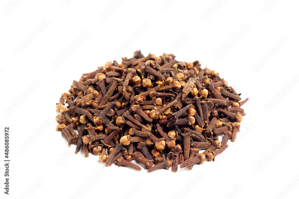 Pile of Cloves isolated on white background. Herbal cloves have a ...