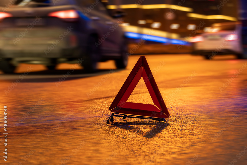 emergency stop sign at night, car breakdown, car stopping on the edge ...