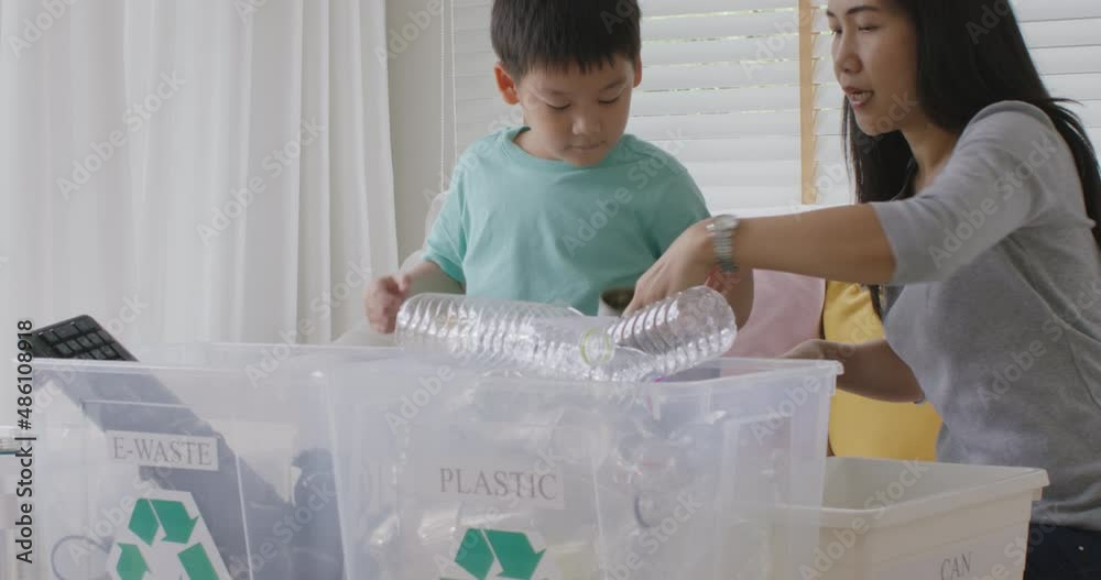 Mom teach Gen Z preteen boy kid dump paper glass can e-waste bag in ...