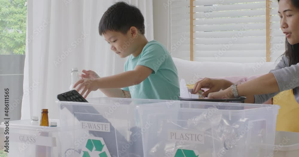 Mom teach Gen Z preteen boy kid dump paper glass can e-waste bag in ...