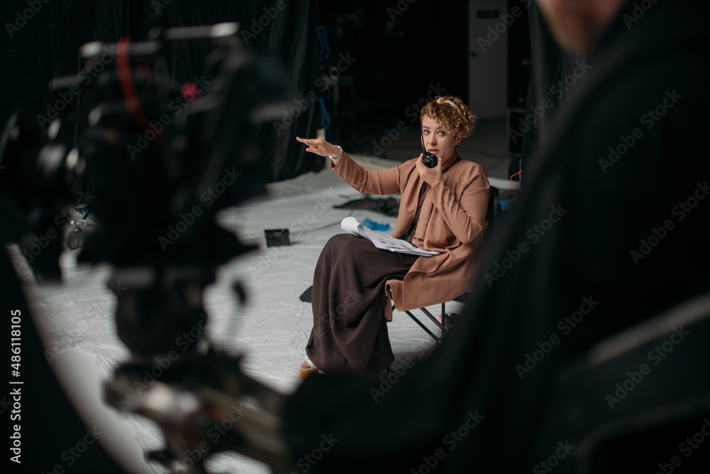 Director at work on the set. Shooting shift, equipment and group ...