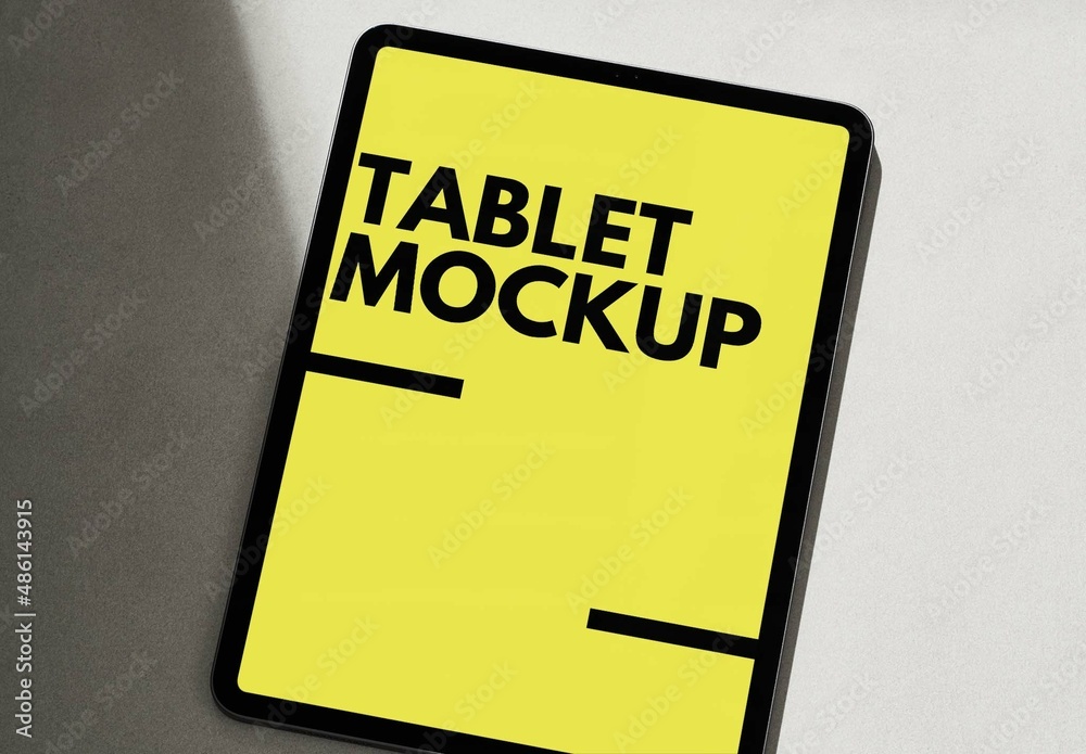 Tablet Mockup on a Grey Background with Sun Light and Shadows Stock ...