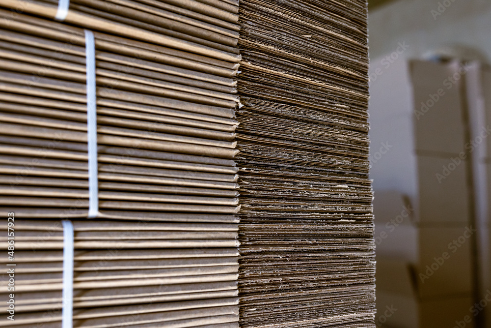 Foto de Folding cardboard boxes. Perforated sheets of corrugated ...