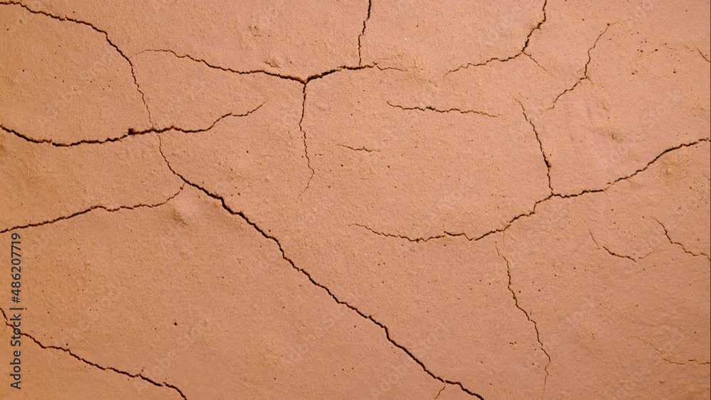 Cracked soil, timelapse. Global climate change and ecology. Drying out ...