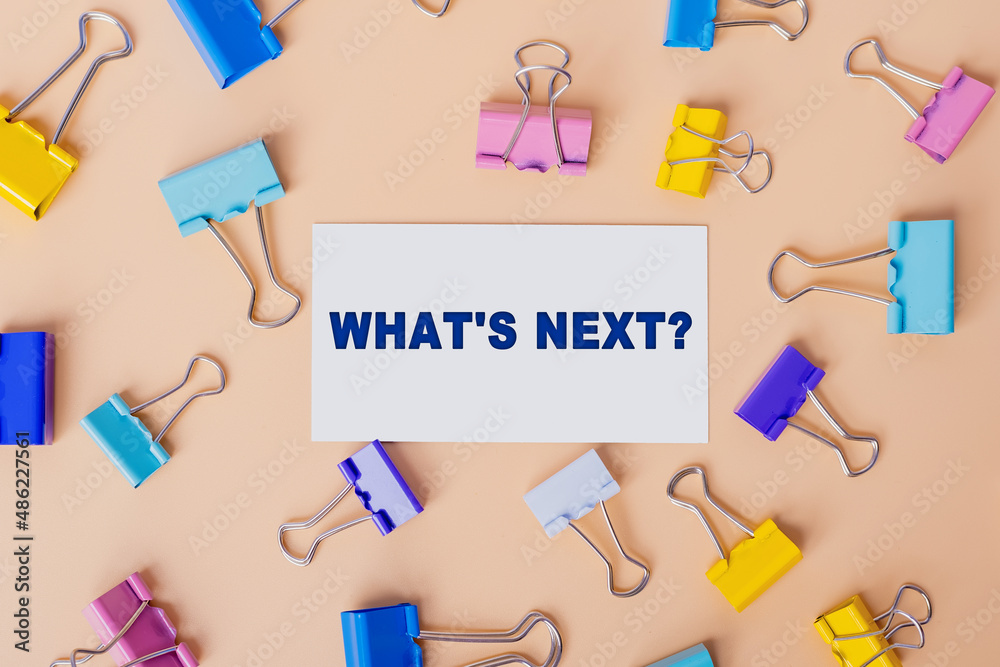 What's Next, text on white card. Top view image of business card and ...