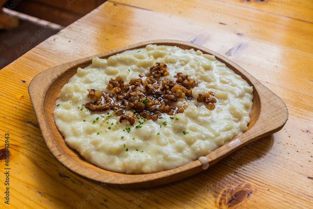 National meal of Slovakia - bryndzove halusky. Boiled lumps of potato ...