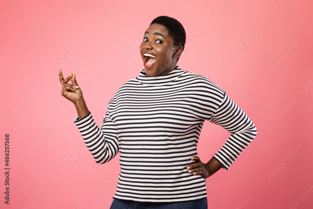 Joyful Plus-Sized African American Female Snapping Fingers Over Pink ...
