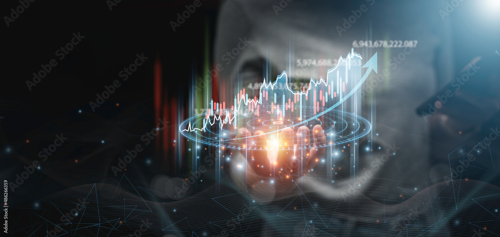 Businesswoman holding virtual target dart board and a growing virtual ...