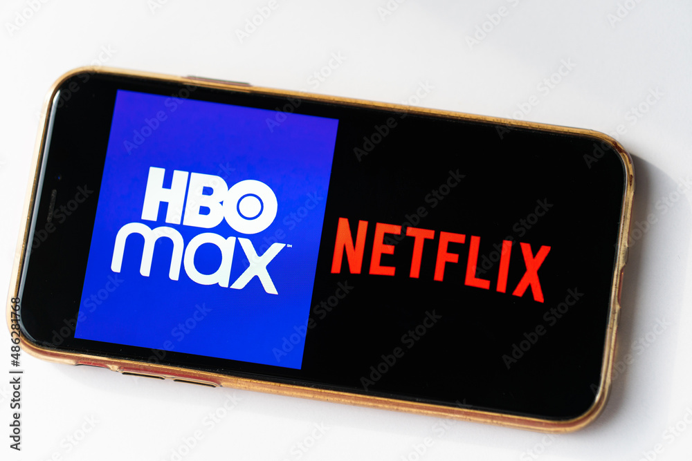 HBO MAX vs Netflix logos on smartphone screen. HBO Max vs. Netflix: How ...