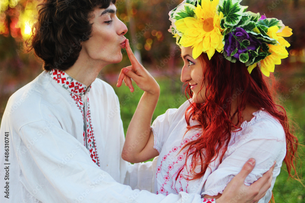 Wedding in traditional costumes of Slavic peoples. People in Ukrainian ...