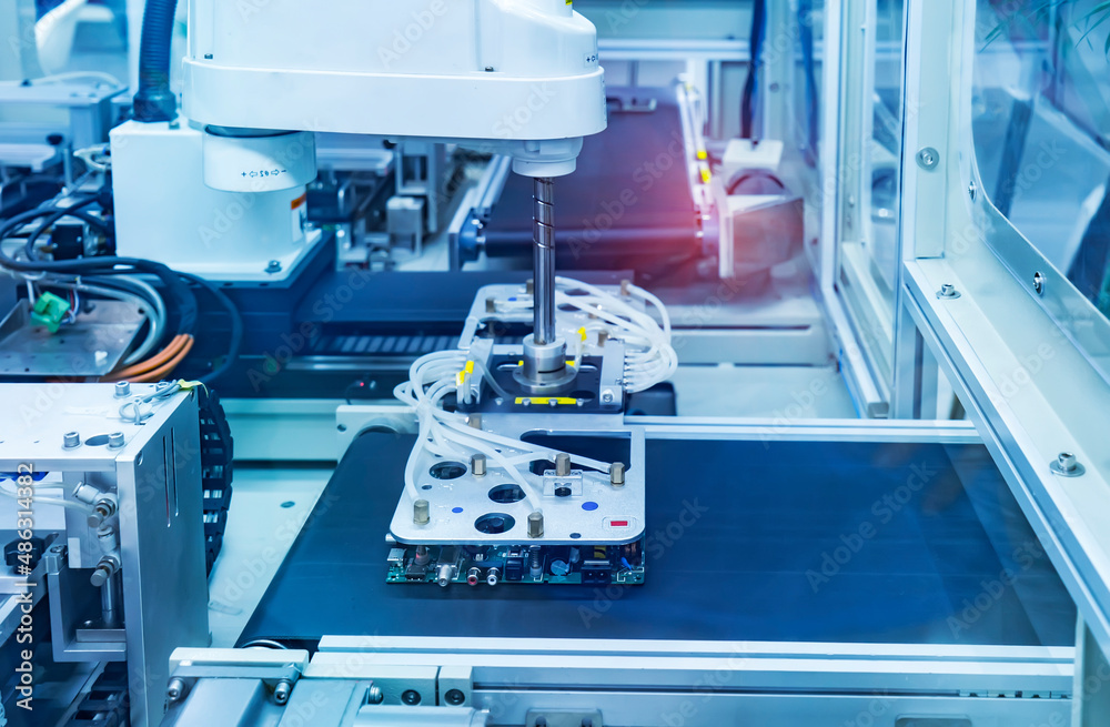 Automation of machine assembly of computer circuit board with robot arm ...