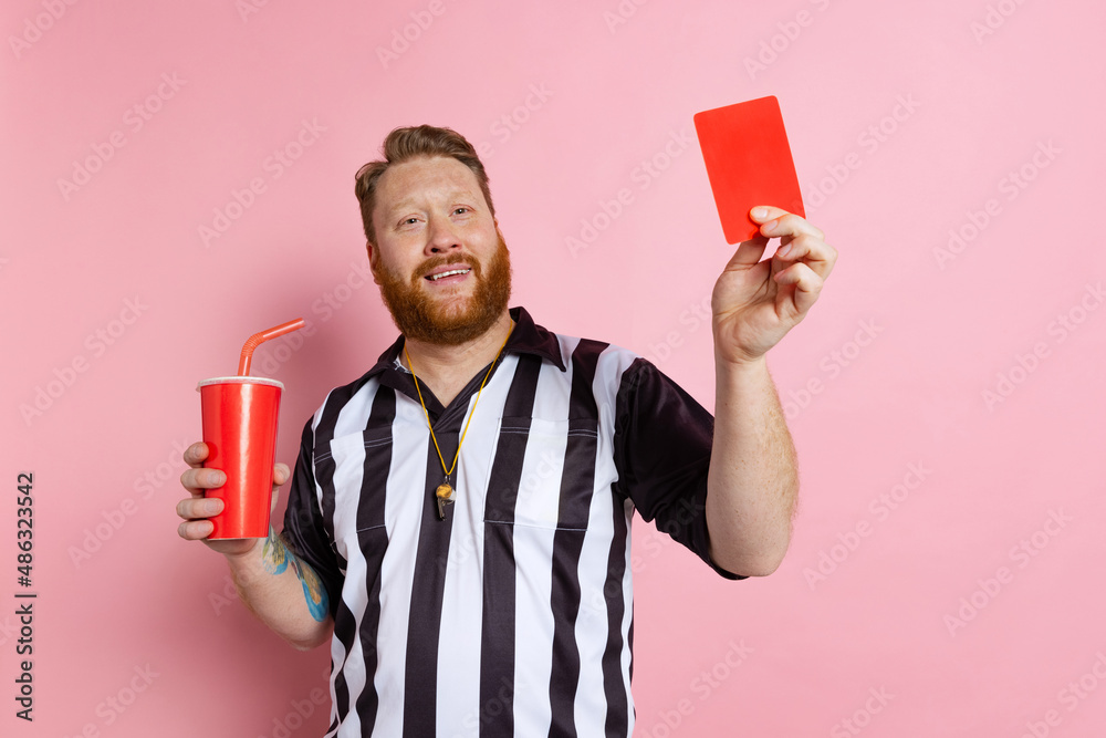 Comic portrait of sport referee wearing field judge uniform isolated on ...