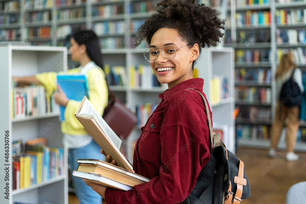 Smiling confident teen girl college student looking at camera. Happy ...