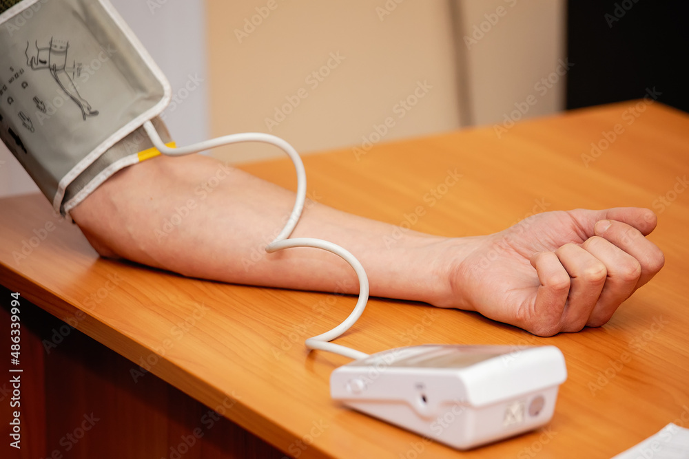 Measurement of human blood pressure with a tonometer. Pressure ...