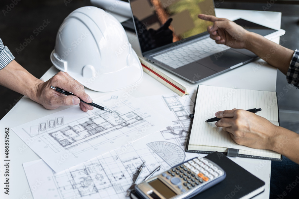 Architecture Engineer Teamwork Meeting, Drawing and working for ...