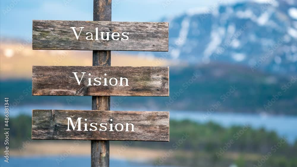 Values vision mission wooden signpost outdoor in nature during blue ... Values vision mission wooden signpost outdoor in nature during blue ...