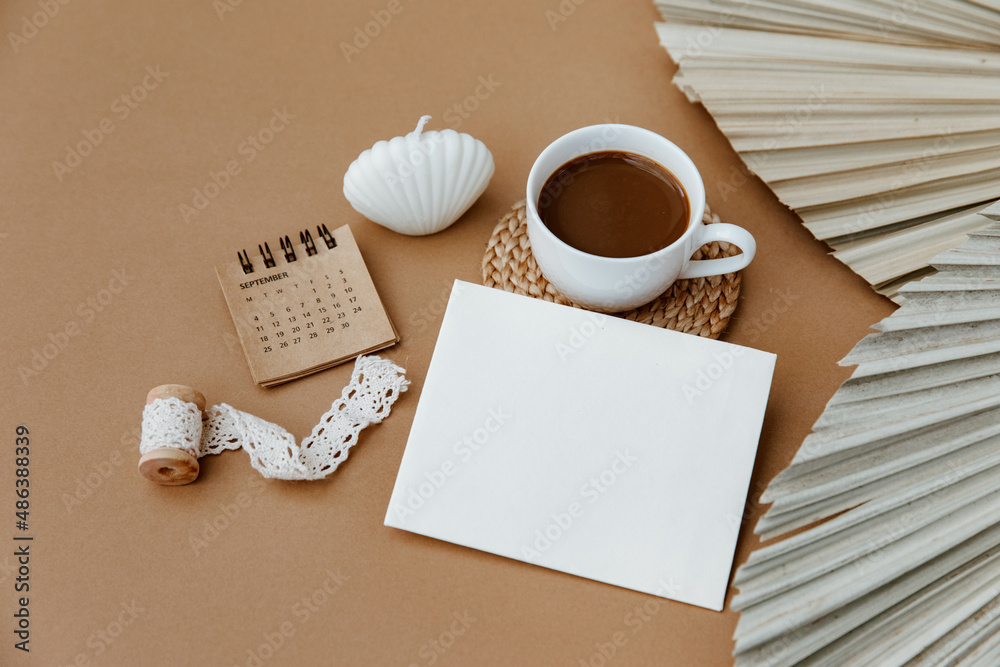 Flat lay Minimal aesthetic background with blank card and calendar on ...