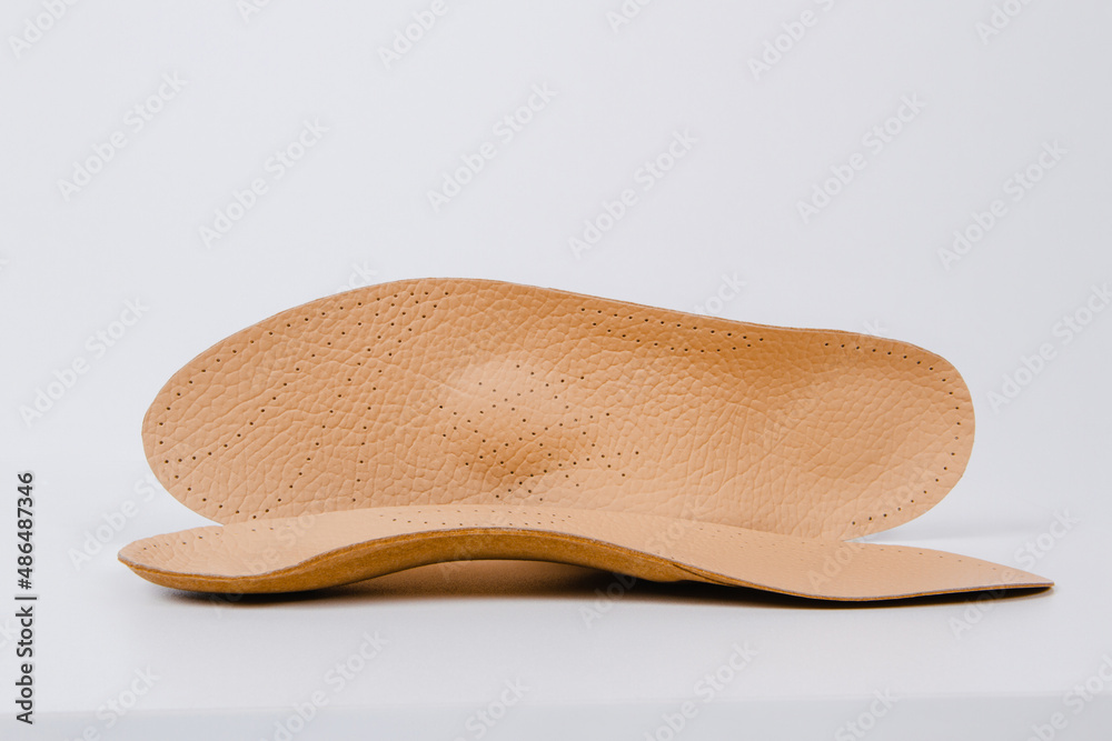 Isolated orthopedic insoles on a white background. Medical insoles ...