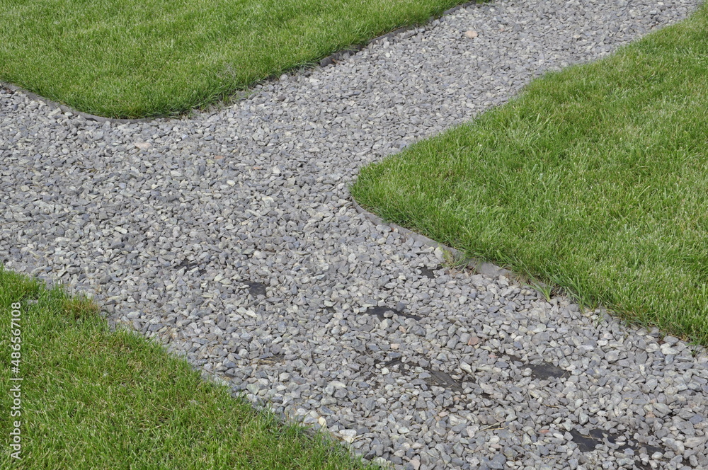 Landscaping of a garden plot. Flowers and plants in landscape design ...