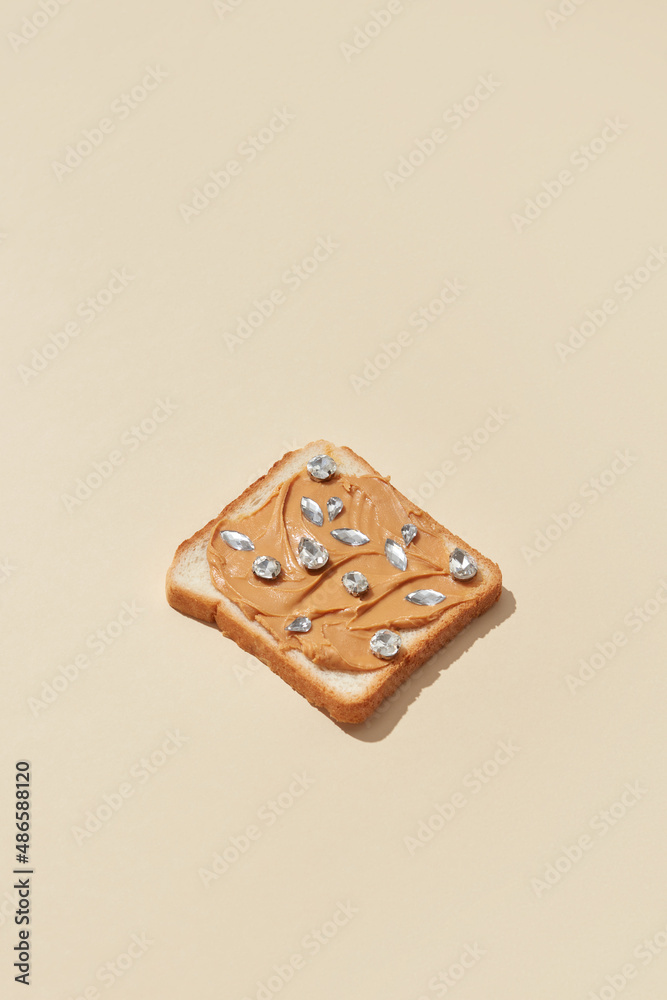Toast with peanut butter and glamorous stones Stock Photo | Adobe Stock