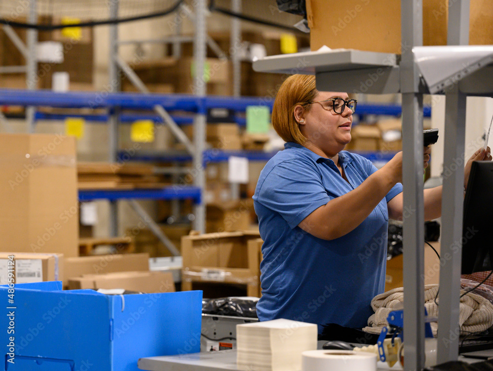 Employee workstation scanning duties Stock Photo | Adobe Stock