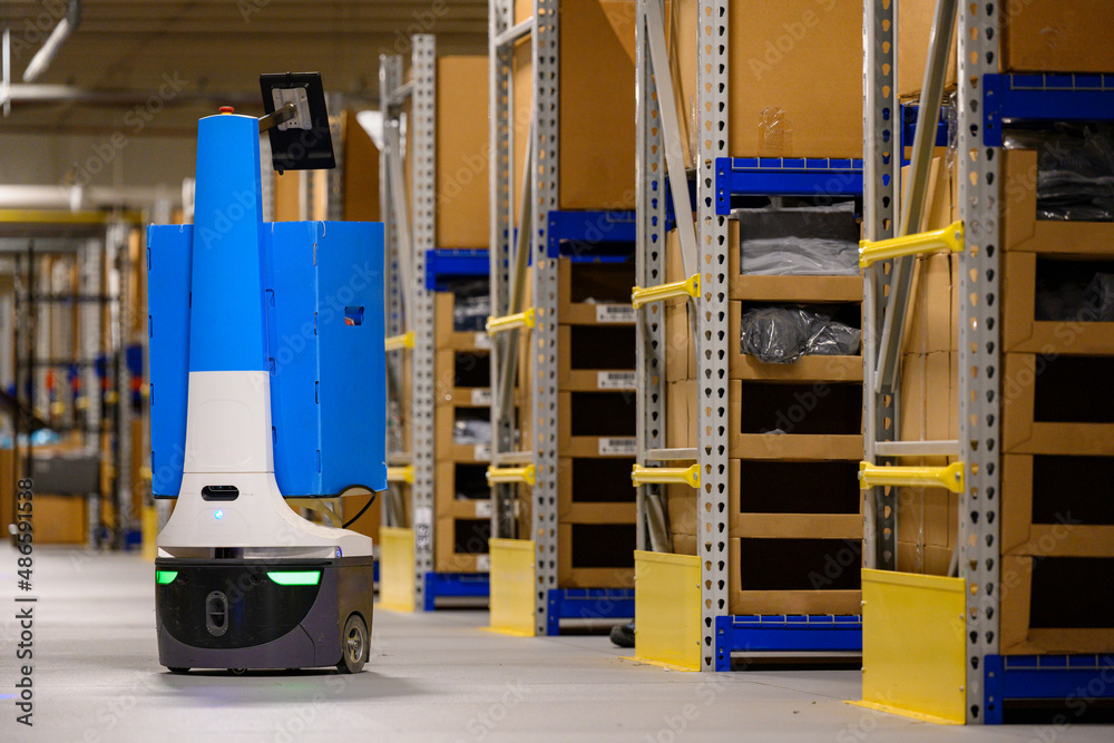 Robot for picking in warehouse with tablet Stock Photo | Adobe Stock