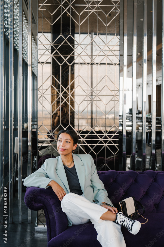 Trendy woman in smart casual outfit Stock Photo | Adobe Stock