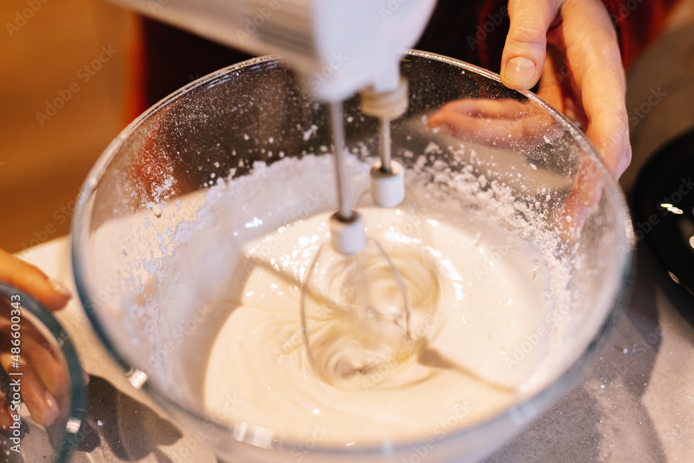 Process of beating ingredients for creating cream Stock Photo | Adobe Stock