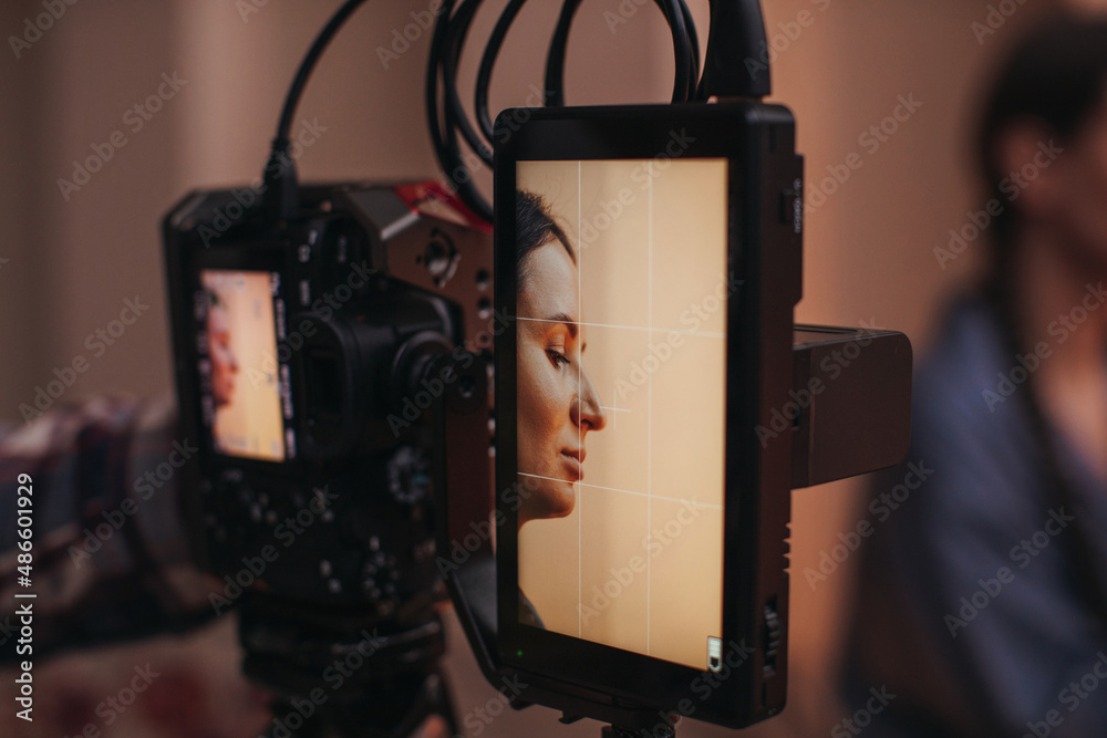 Camera shooting peaceful female model Stock Photo | Adobe Stock