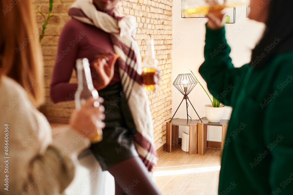 Women hanging out together in a stylish home Stock Photo | Adobe Stock