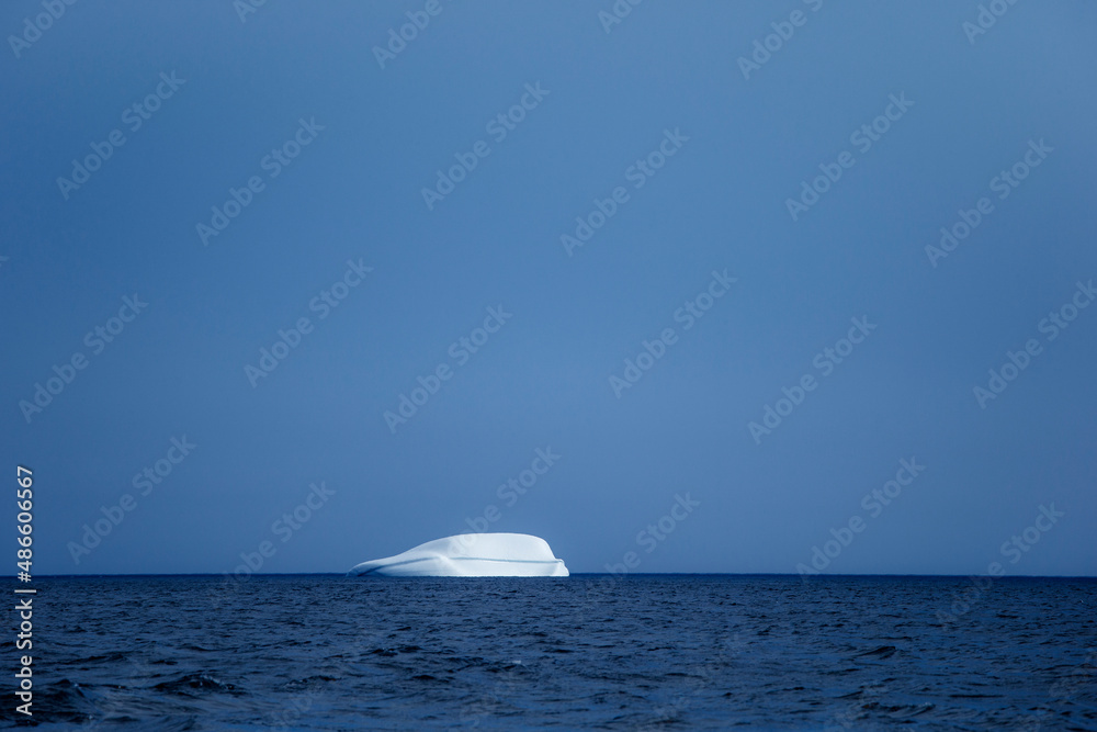 Icebergs floating in the melting sea ice in the Davis Strait. Stock ...