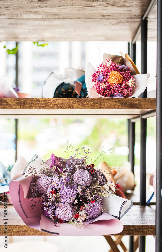 Preserved fresh flowers on cabinet Stock Photo | Adobe Stock